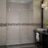Aston Langham 60 in. x 75 in. Completely Frameless Sliding Shower Door in Stainless Steel with ...
