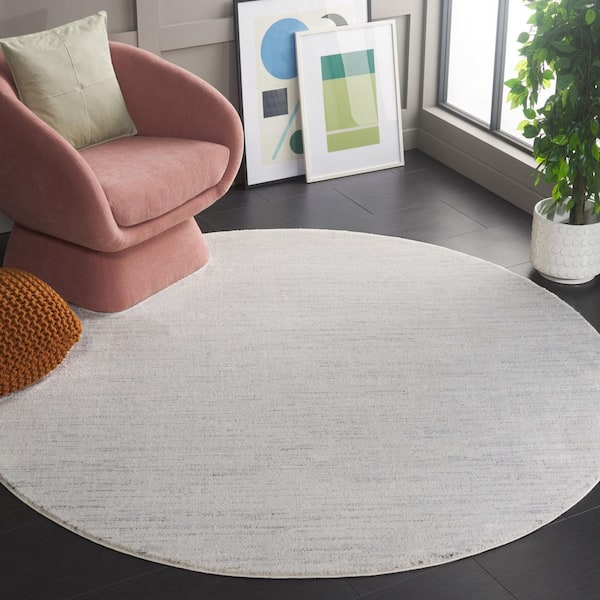 SAFAVIEH Revive 7 ft. x 7 ft. Ivory Modern Solid Round Area Rug REV114A ...
