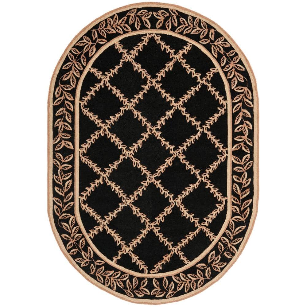 SAFAVIEH Chelsea Black/Gold 5 ft. x 7 ft. Oval Border Area Rug HK230D ...
