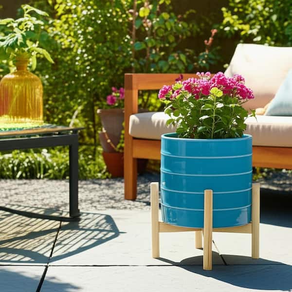 Liv & Skye Blue Ceramic Striped Decorative Pot (10 in. W x 11 in. H ...