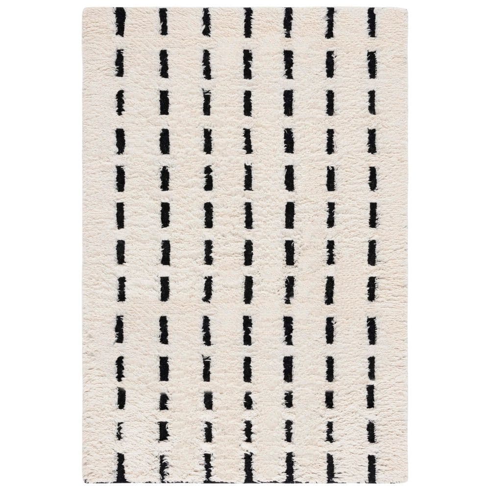 SAFAVIEH Casablanca 5 ft. x 8 ft. Black/Ivory Dash Flokati Area Rug ...
