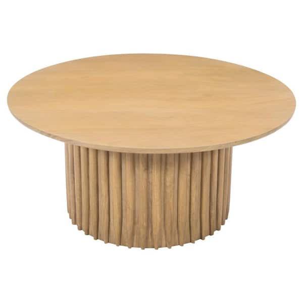 The Urban Port Sejo Coffee Table 34 inch Round Top with Fluted Base in Natural Brown Mango Wood