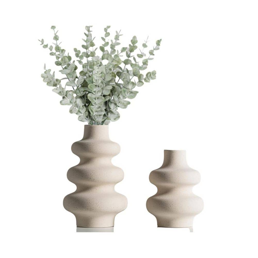 A set of 2 round off-white ceramic vases, 8.5" and 5.9" high. LX0042 ...