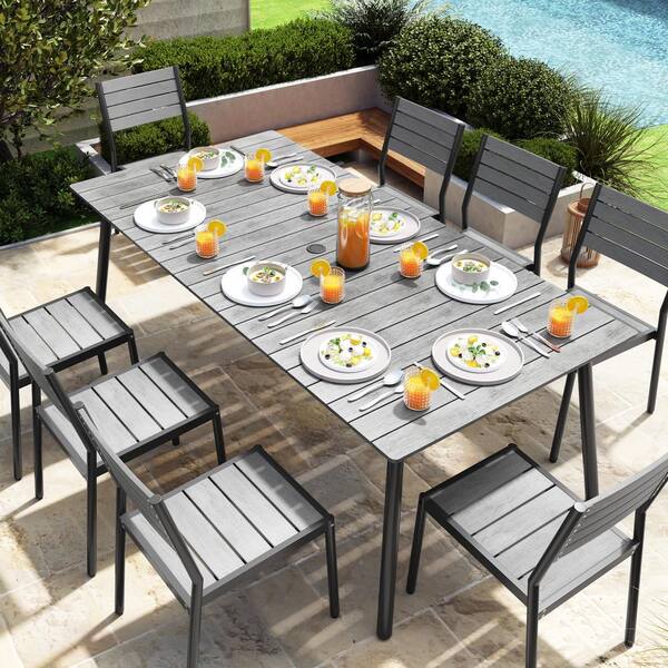 Pellebant 7 of Pieces Composite Wood Aluminum Outdoor Dining Set with Stackable Chairs Gray PB DC5002GRY 7 The Home Depot