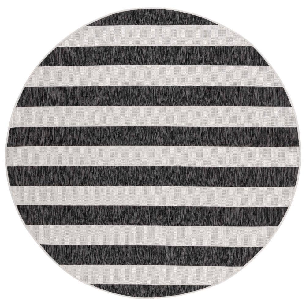 SAFAVIEH Courtyard Ivory/Black 7 ft. Round Striped Indoor/Outdoor Area ...