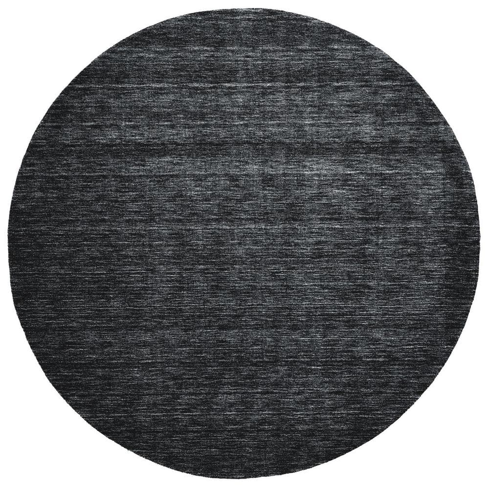 HomeRoots 8' Round Black Solid Color Area Rug 2000511047 - The Home Depot