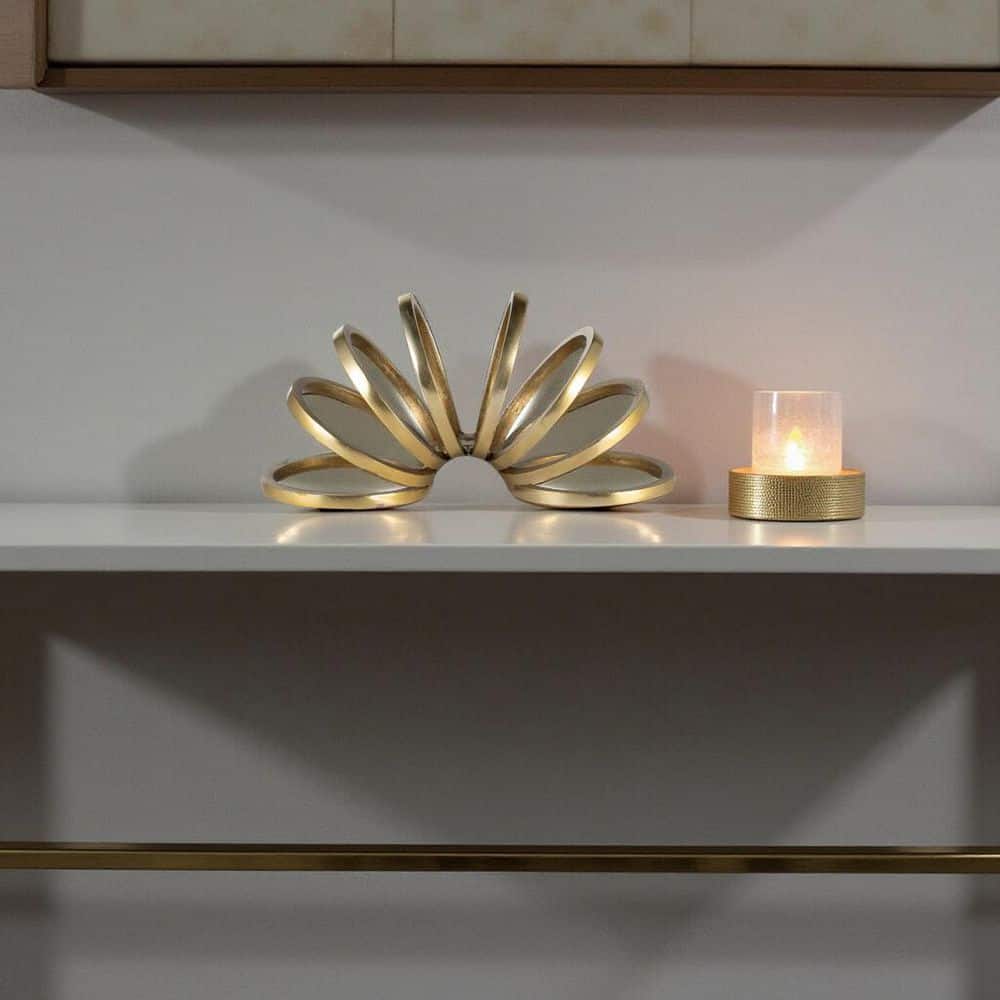 Liv & Skye Gold 11 in. x 5.5 in. Metal Slinky Ring Sculpture 17774-02 ...