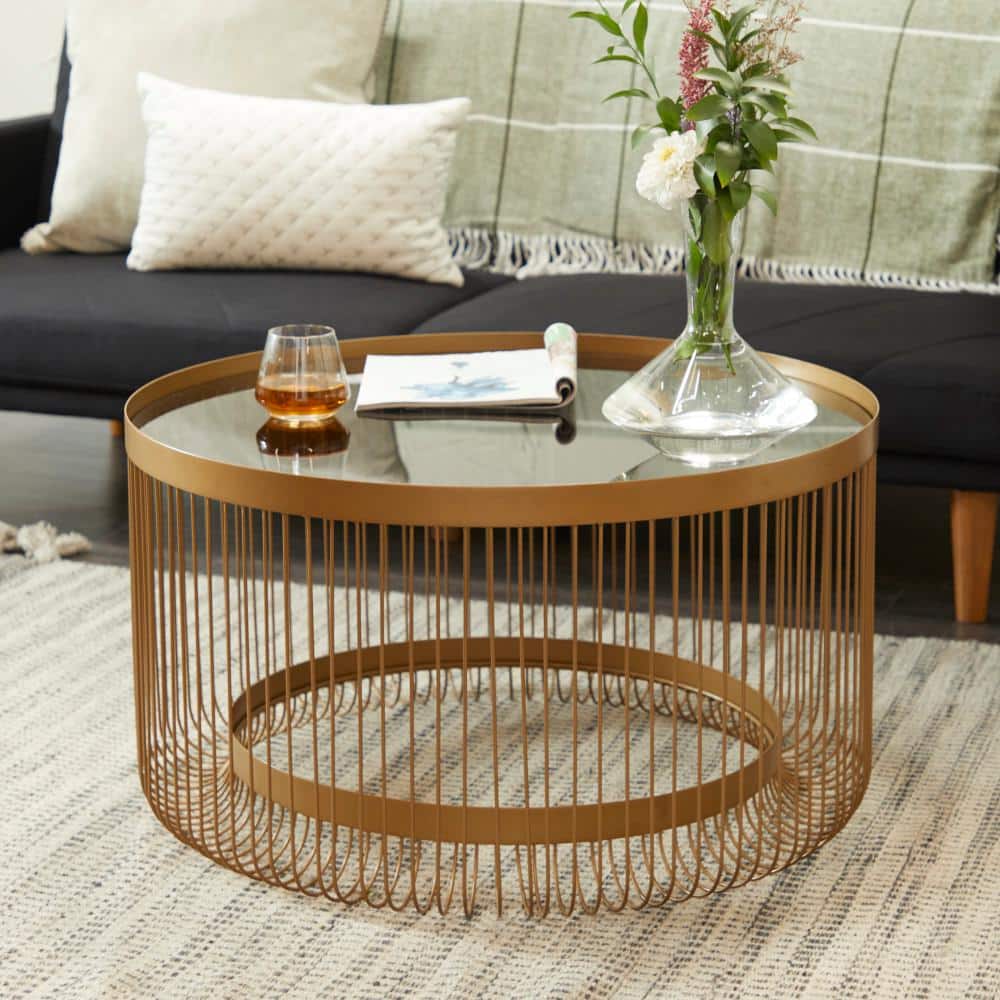 Litton Lane 32 in. Gold Round Metal Coffee Table with Tinted Glass Top ...