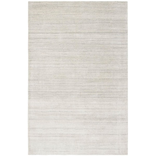 SAFAVIEH Mirage 5 ft. x 8 ft. Ivory/Gray Distressed Solid Color Area ...