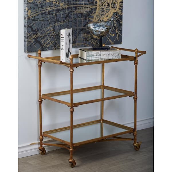 Litton Lane 33 in. H Brass Metal Traditional Bar Cart 87441 - The Home ...