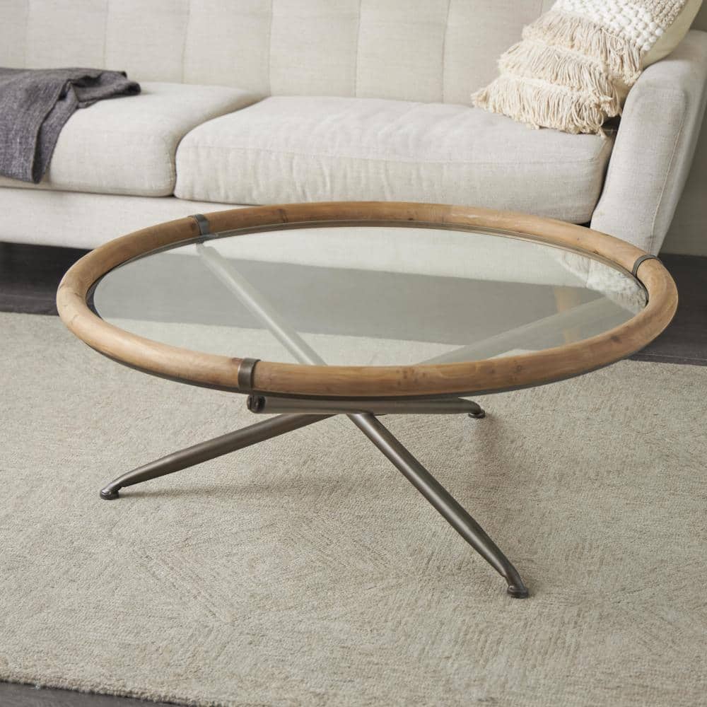 Litton Lane 16 in. x 39 in. Brass Medium Round Metal Round Coffee Table ...