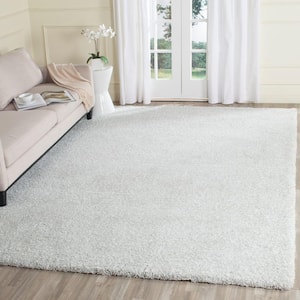 SAFAVIEH Ultimate Shag Sand/Ivory 8 ft. x 10 ft. Solid Area Rug SGU211C-8