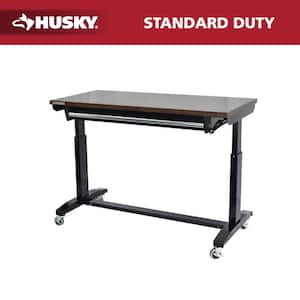 Husky 46 in. W x 24 in. Deep Adjustable Height Work Table with Solid ...