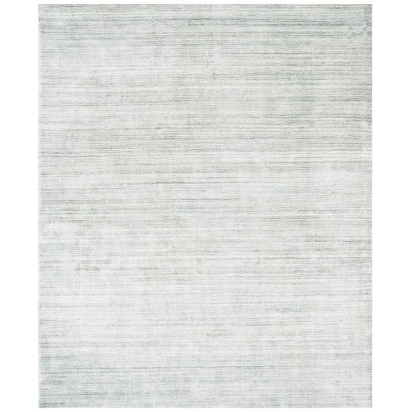 SAFAVIEH Mirage 9 ft. x 12 ft. Light Gray Distressed Solid Color Area ...