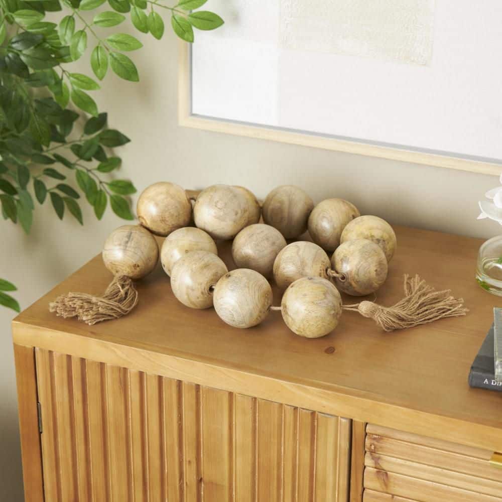 Litton Lane Brown Handmade Mango Wood Round Extra Long Orb Garland with ...