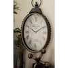 Litton Lane 12 in. x 21 in. Black Metal Pocket Watch Style Wall Clock ...
