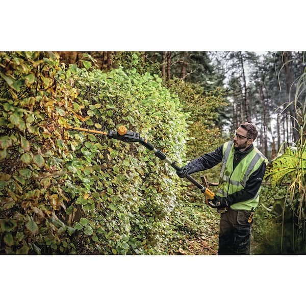 DEWALT 20V MAX 22 in. Cordless Battery Powered Pole Hedge Trimmer Kit with 1 4 Ah Battery Charger DCPH820M1 The Home Depot