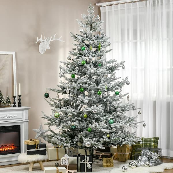 Snowy artificial christmas tree store