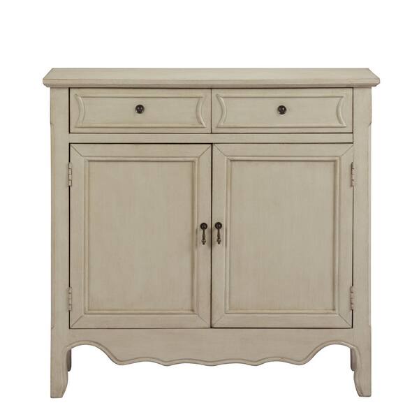 Coast To Coast Accents Antique Ivory 36 in. 2-Drawer 2-Door Cupboard ...