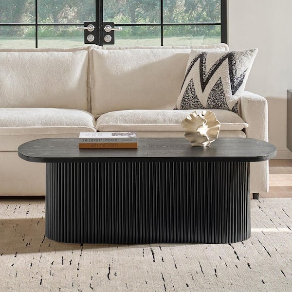 JAYDEN CREATION Ovar 47.25 in. Black Oval Wood Coffee Table with Fluted ...