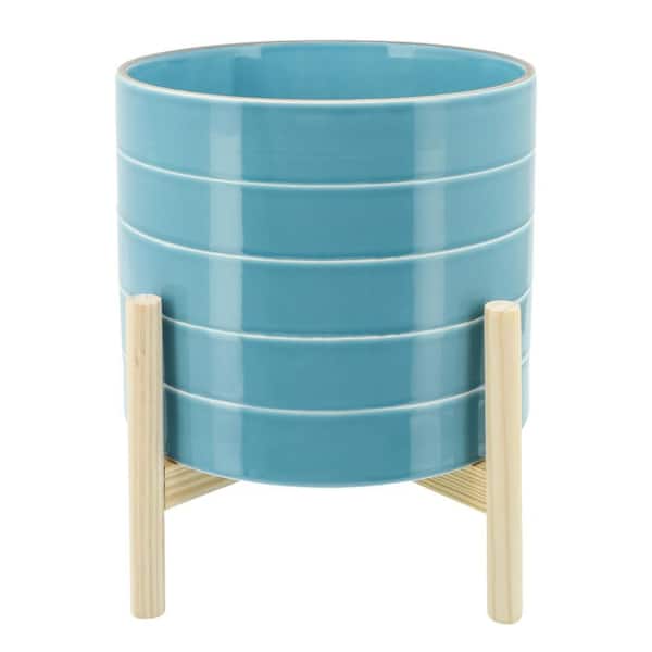 Liv & Skye Blue Ceramic Striped Decorative Pot (10 in. W x 11 in. H ...