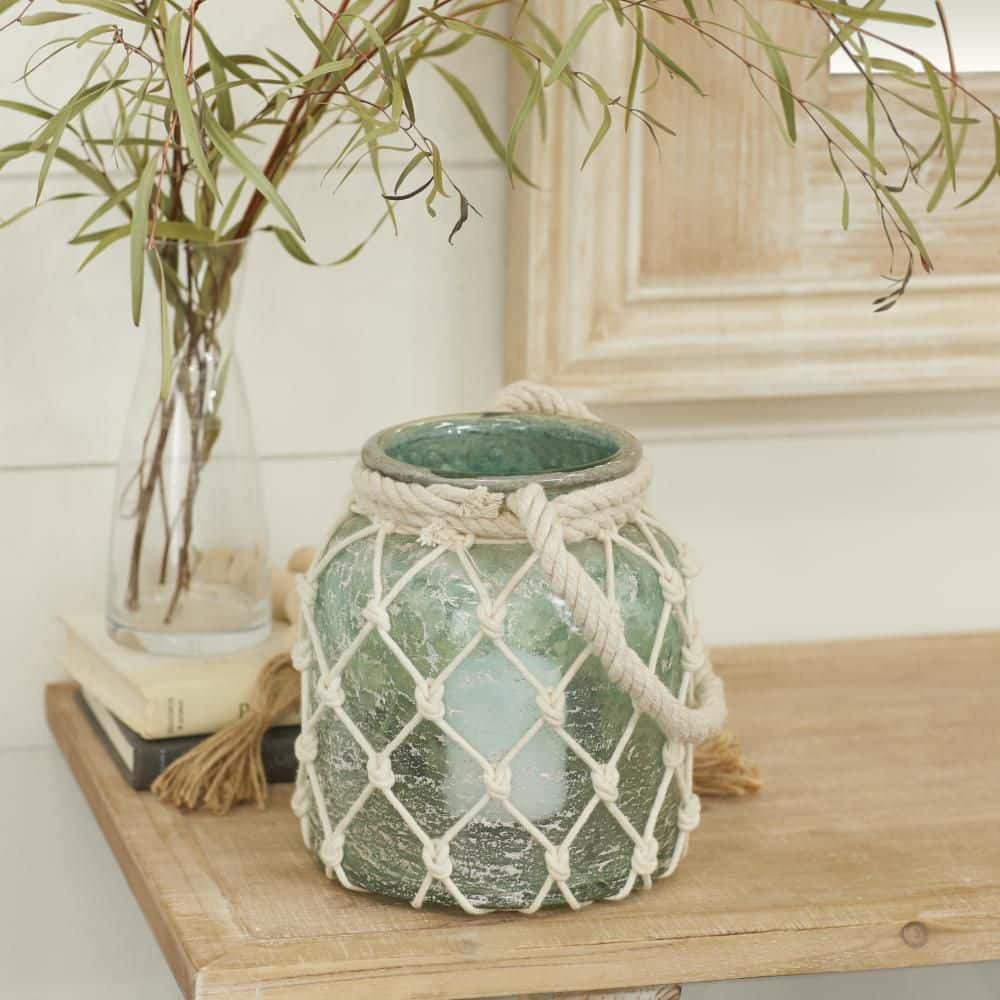 Litton Lane 15 in. H Blue Glass Decorative Candle Lantern with Rope ...