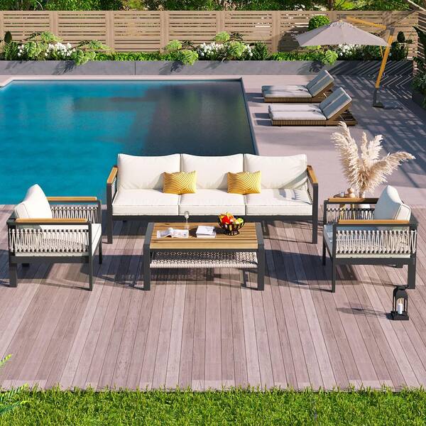 Zeus & Ruta 4-Piece Black Metal Patio Conversation Set with Beige ...