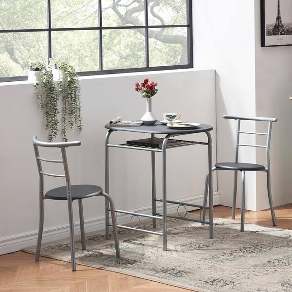 Compact round table and chairs store