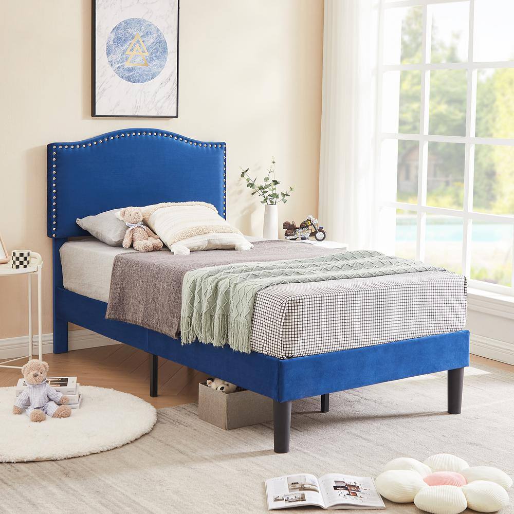 Blue upholstered twin bed store