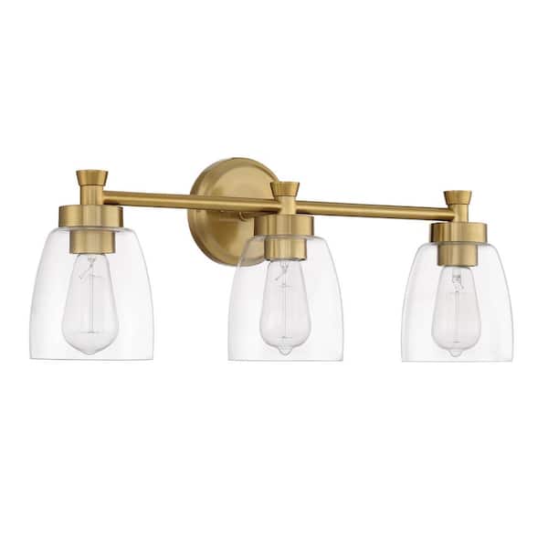 CRAFTMADE Henning 24 in. 3-Light Satin Brass Finish Vanity Light with Clear Glass Shade ...