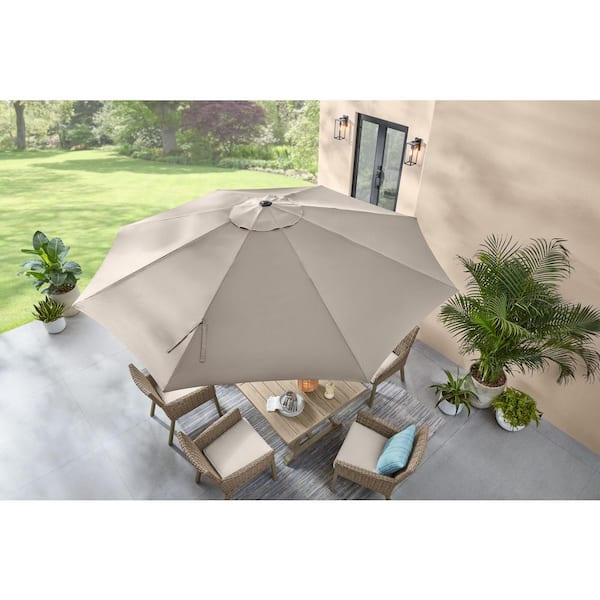 Hampton Bay Holly Cove 7 Piece Wicker Rectangular Outdoor Dining Set with CushionGuard Almond Cushions FRS60977B ST