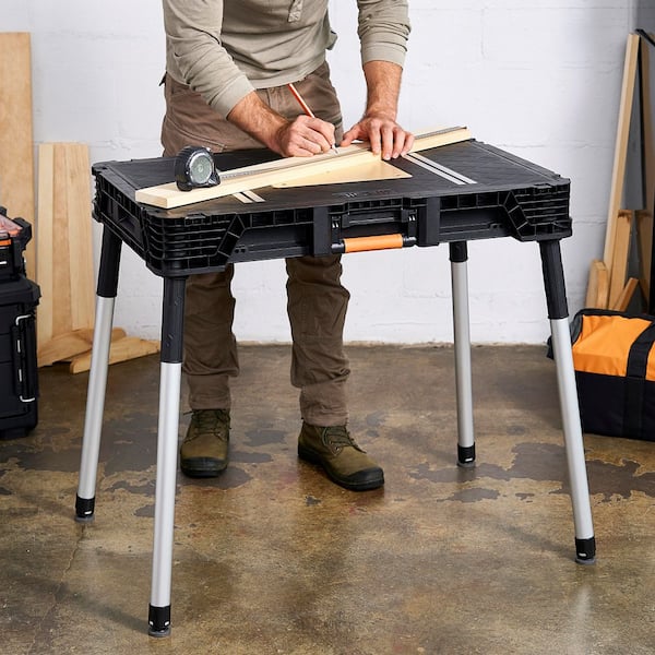 RIDGID 22 in. W x 34.6 in. D Portable Work Table with Plastic Top and ...