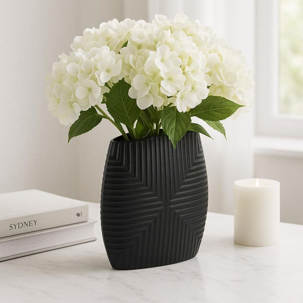 Liv & Skye 10 in. Black Metal Round Decorative Vase with Geometric ...