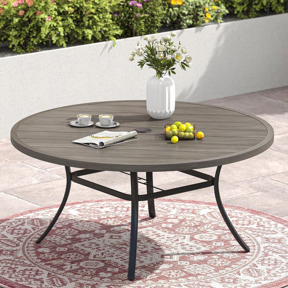 Zeus & Ruta 53 in. Round Metal Outdoor Dining Table with Adjustable ...