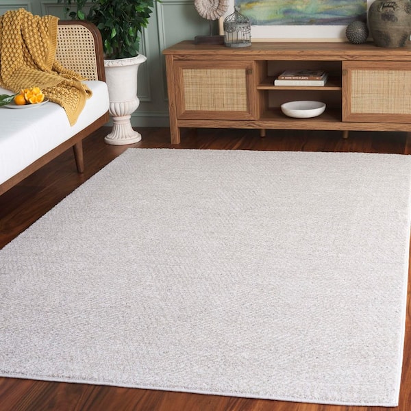 SAFAVIEH Northport 8 ft. x 10 ft. Ivory/Beige Distressed Solid Color ...