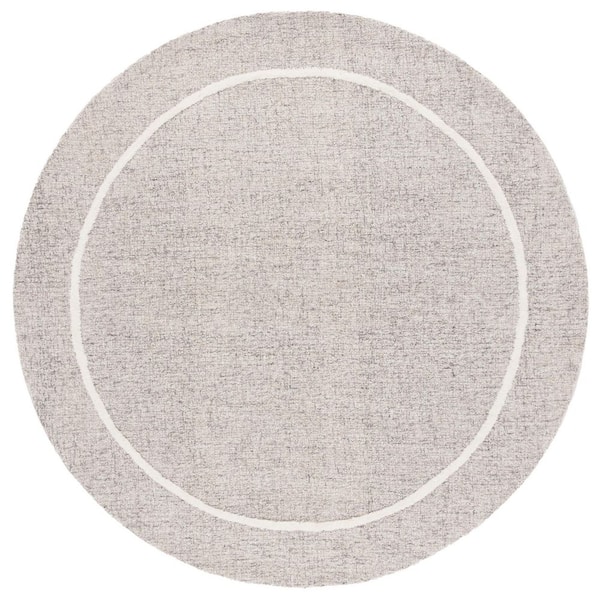 SAFAVIEH Ebony 6 ft. x 6 ft. Gray/Ivory Modern Solid Border Round Area ...