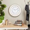 Litton Lane 24 in. x 24 in. White Metal Wall Clock 18963 - The Home Depot