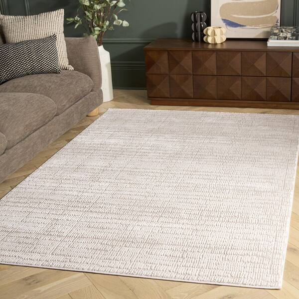 SAFAVIEH Alba 5 ft. x 7 ft. Ivory/Beige Solid Color Area Rug ALB122A-5 ...