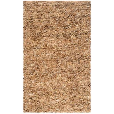 SAFAVIEH Leather Shag Light Gold 6 ft. x 6 ft. Round Solid Area Rug ...