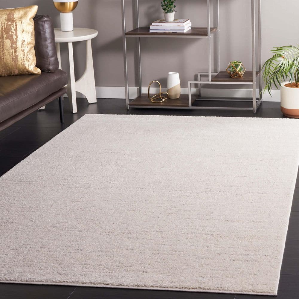 SAFAVIEH Revive 7 ft. x 9 ft. Ivory Modern Solid Area Rug REV114A-6 ...