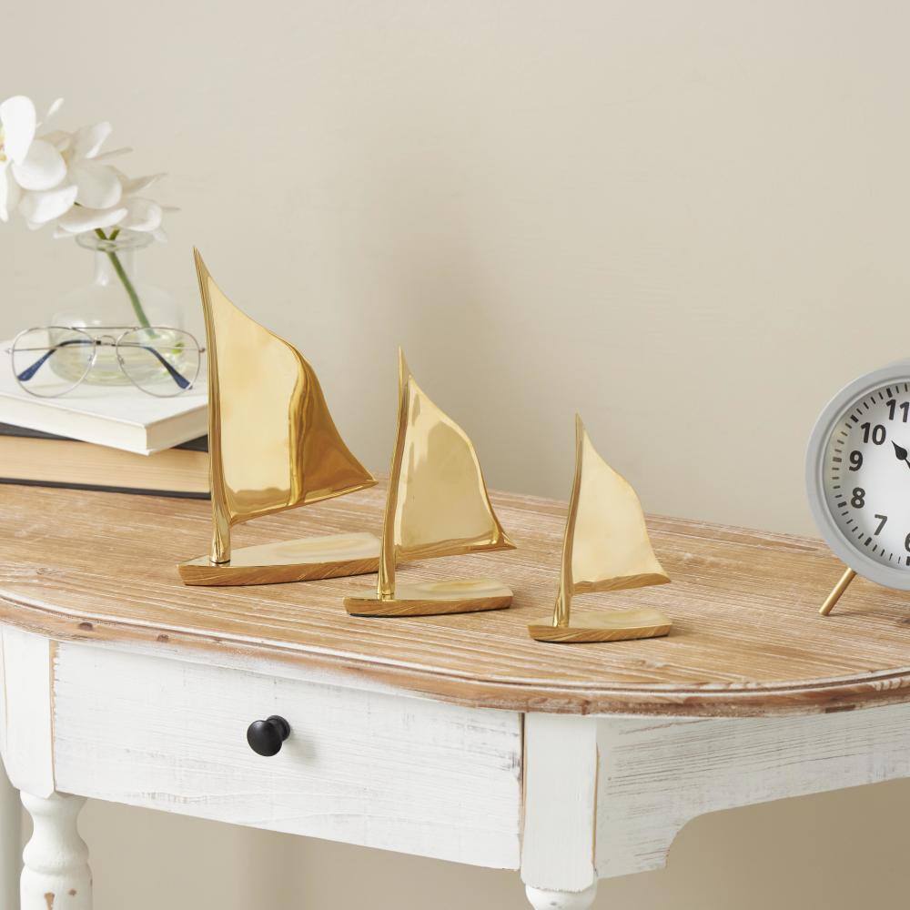 Litton Lane Gold Metal Sail Boat Sculpture (Set of 3) 045316 - The Home ...